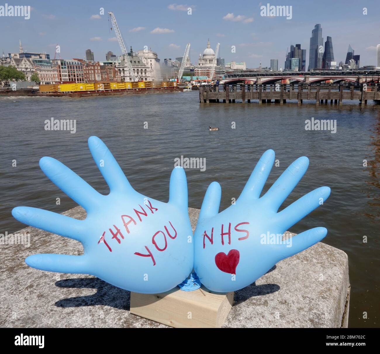 Disposable gloves with he words Thank you NHS written on them left by ...
