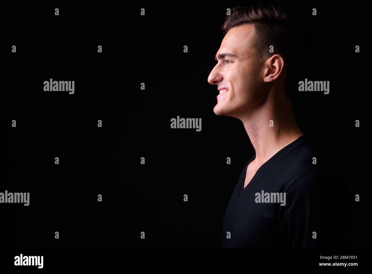 Handsome profile smile portrait young hi-res stock photography and ...