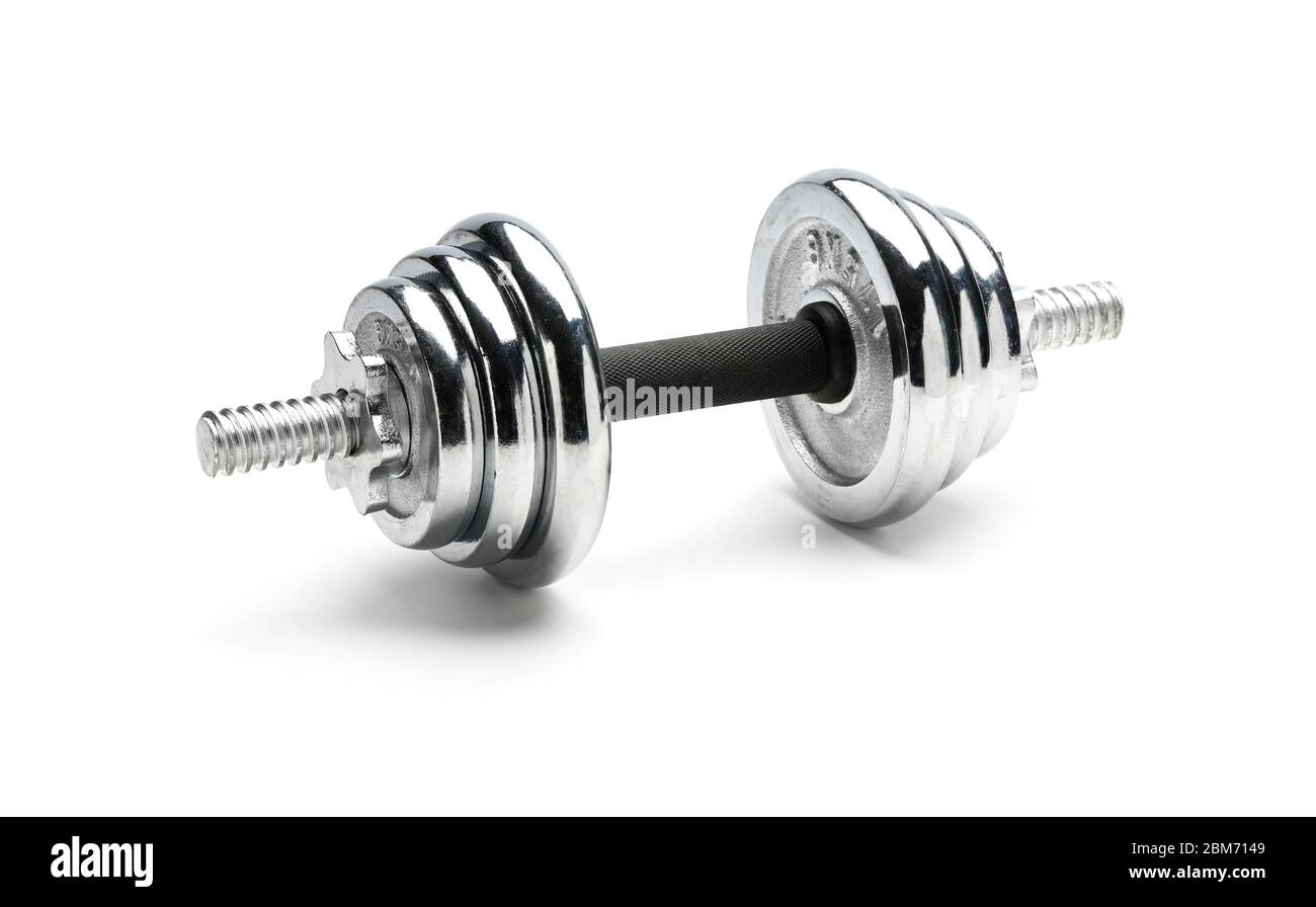 Silver coloured shiny metal dumbbell isolated over white background ...