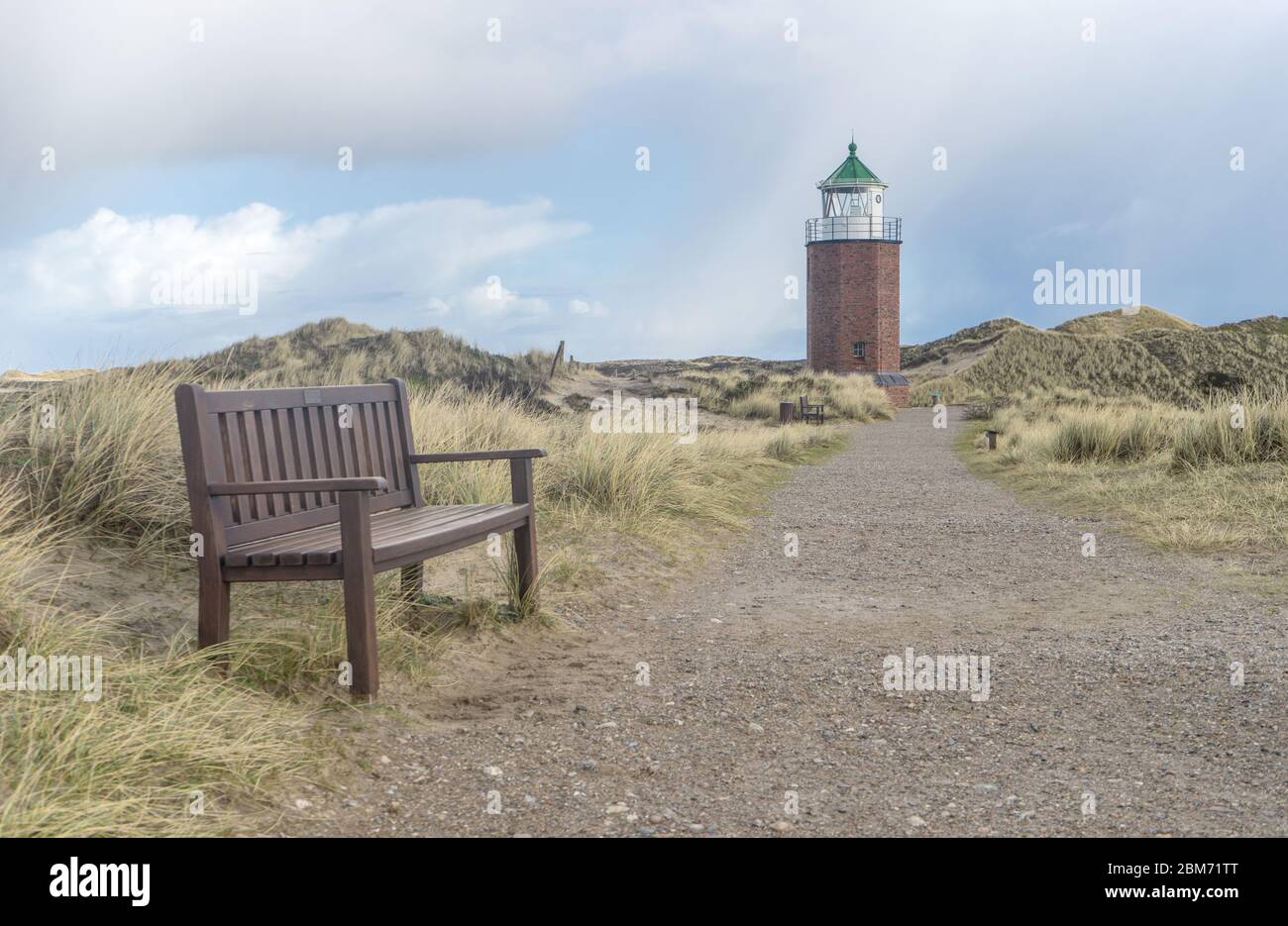 Lighthouse and bench on the Red Reef on the island of Sylt near Kampen ...