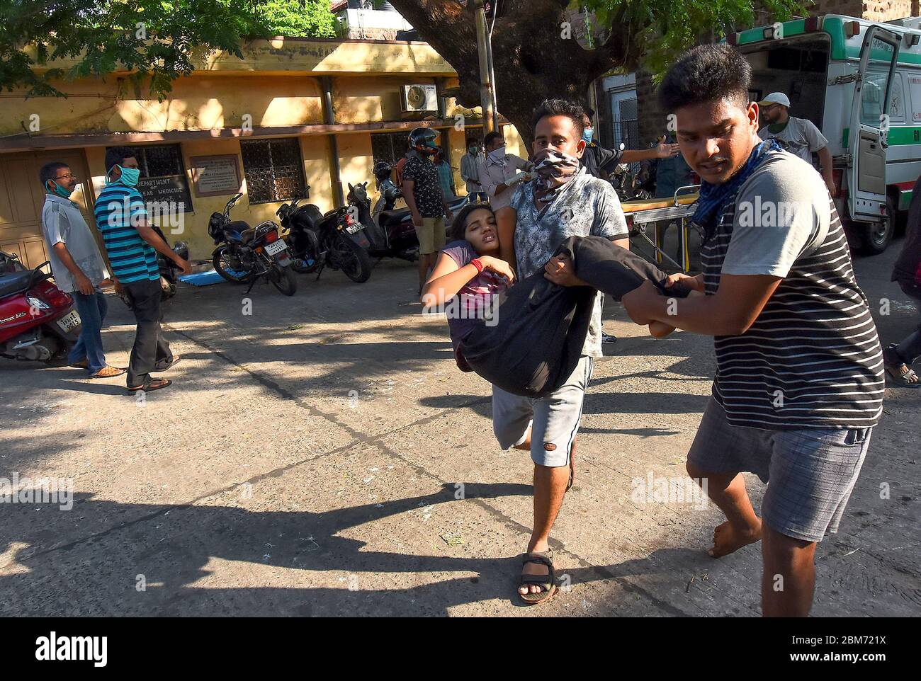 Guy Carrying Limp Girl In Arms