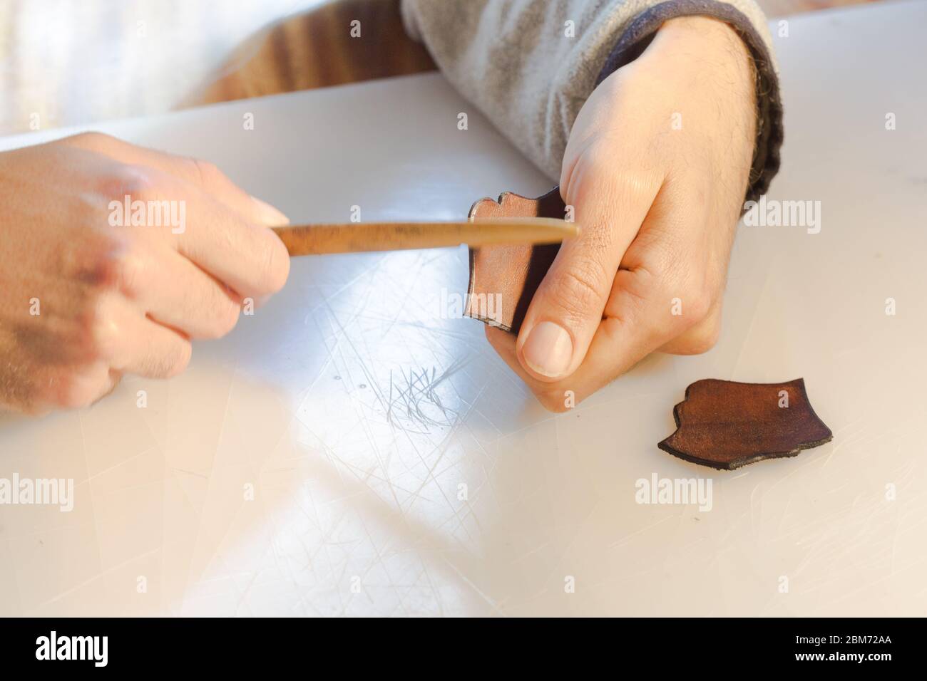 Leather edge burnishing, leather edge finishing by handmade tools. The ...