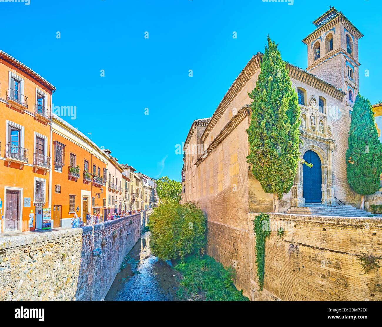 GRANADA, SPAIN - SEPTEMBER 25, 2019: Darro river is boardered with high ...