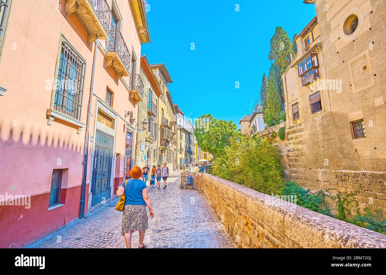 GRANADA, SPAIN - SEPTEMBER 25, 2019: The line of colorful medieval ...