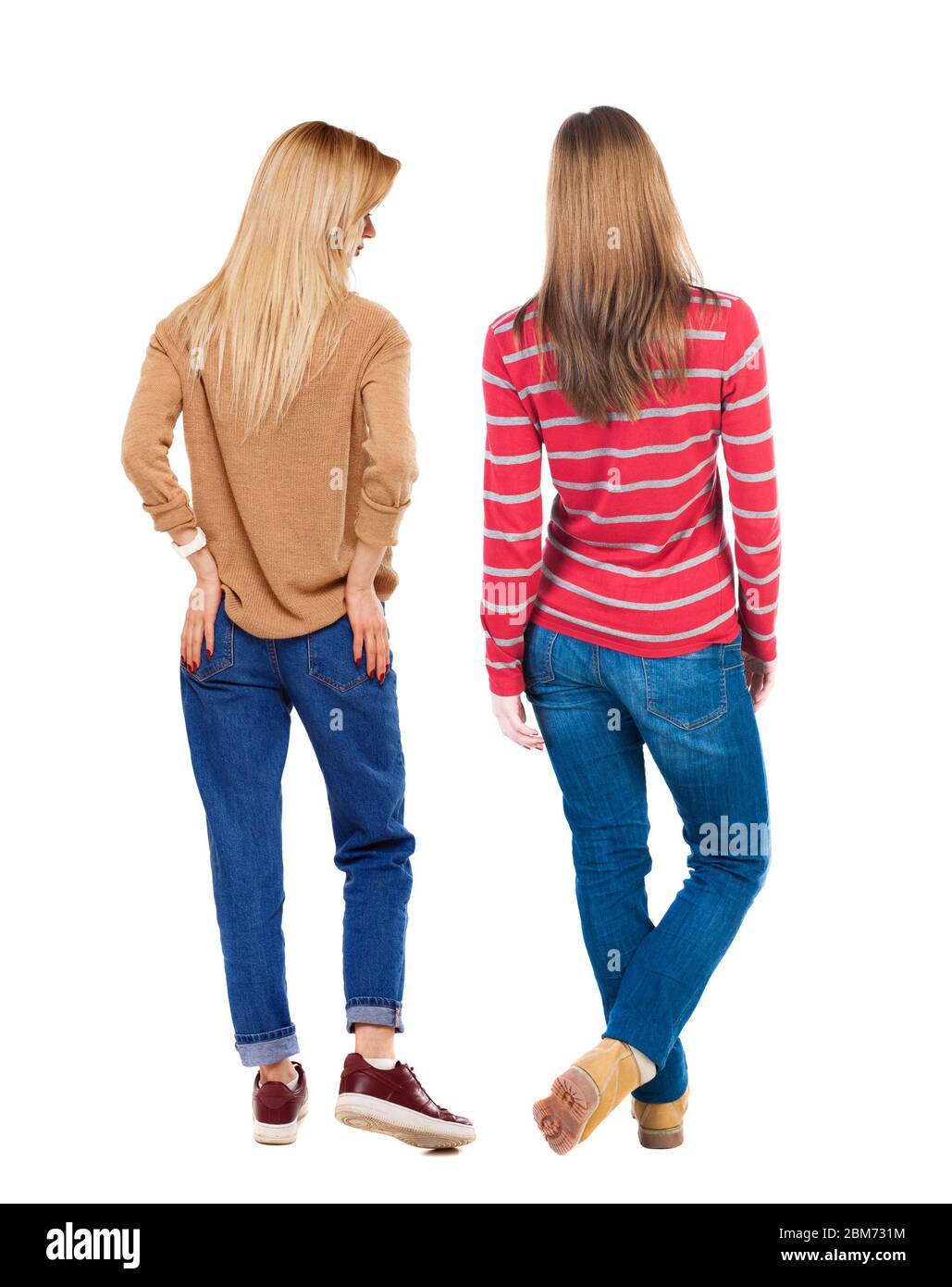 Back view of two woman in sweater. Rear view people collection ...