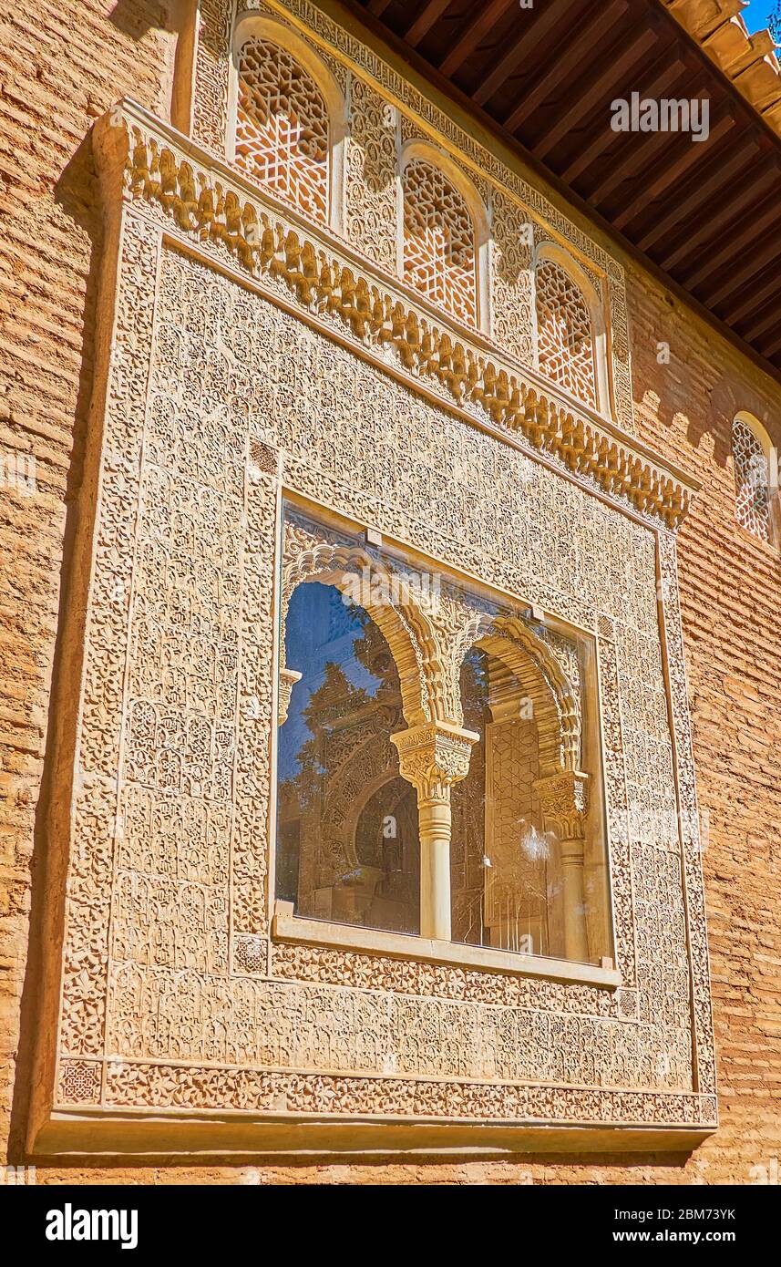 Ornate window frame of Partal chapel, decorated with fine Islamic ...