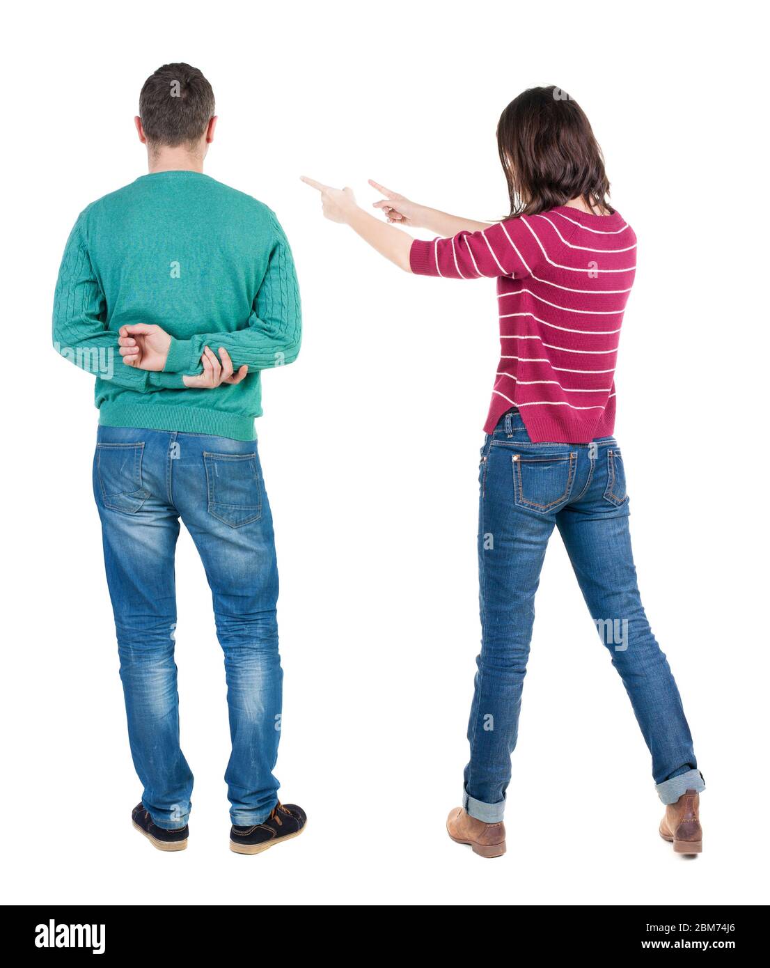 Back view of couple in sweater pointing. Rear view people collection ...