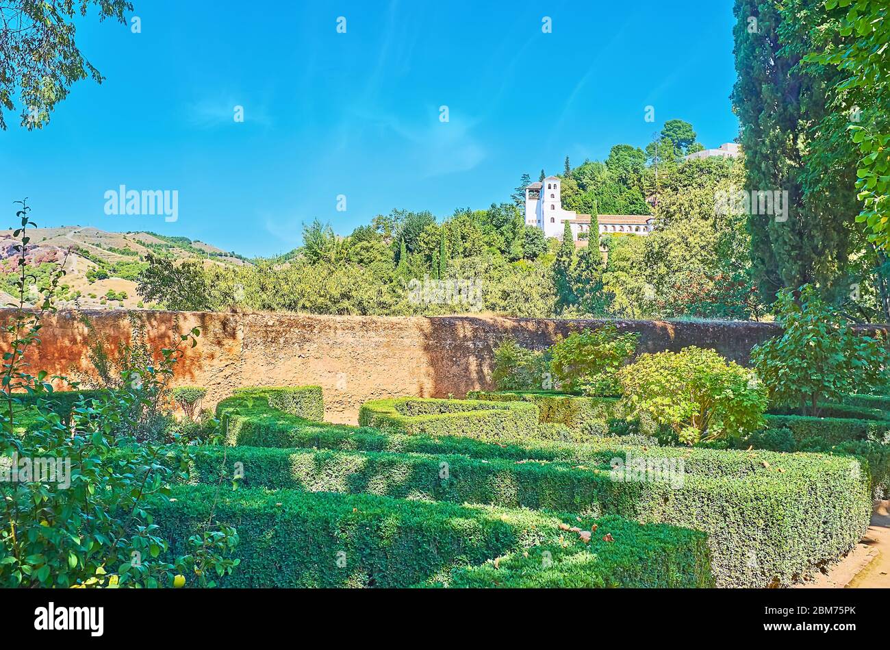Walk along the medieval rampart of Alhambra and enjoy the view on ...