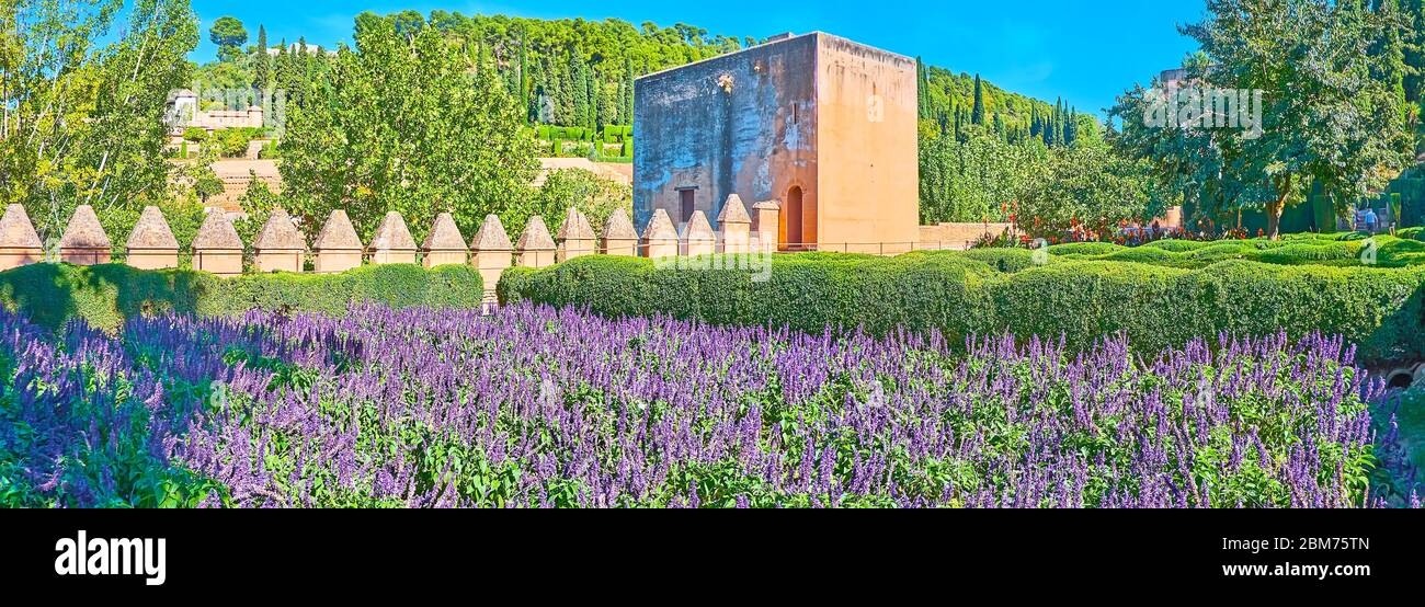 Panorama of Alhambra garden with rampart, topped with battlements ...
