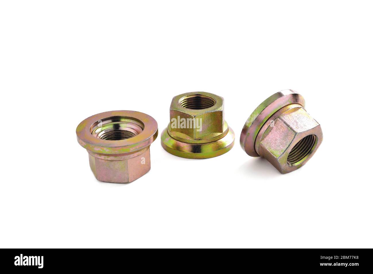 galvanized fixing nuts several pieces on a white background close-up ...