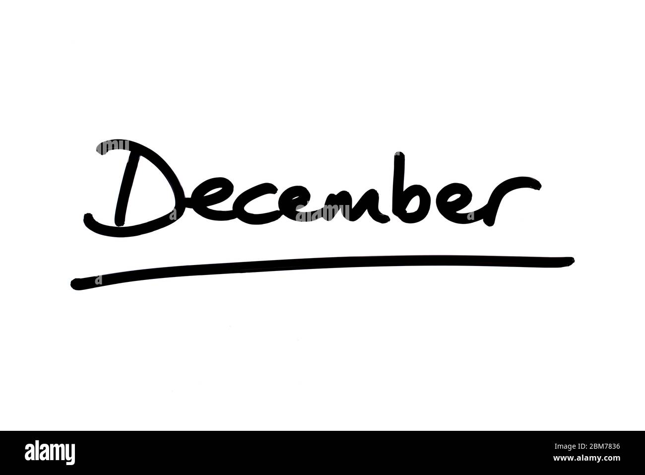 December handwritten on a white background Stock Photo - Alamy