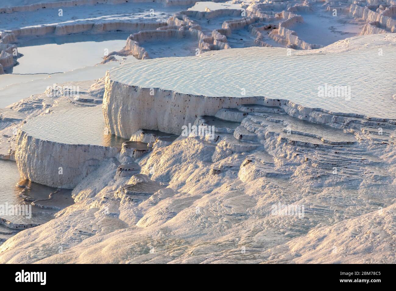 Natural pools in limestone mountains in Pamukkale, Turkey Stock Photo ...
