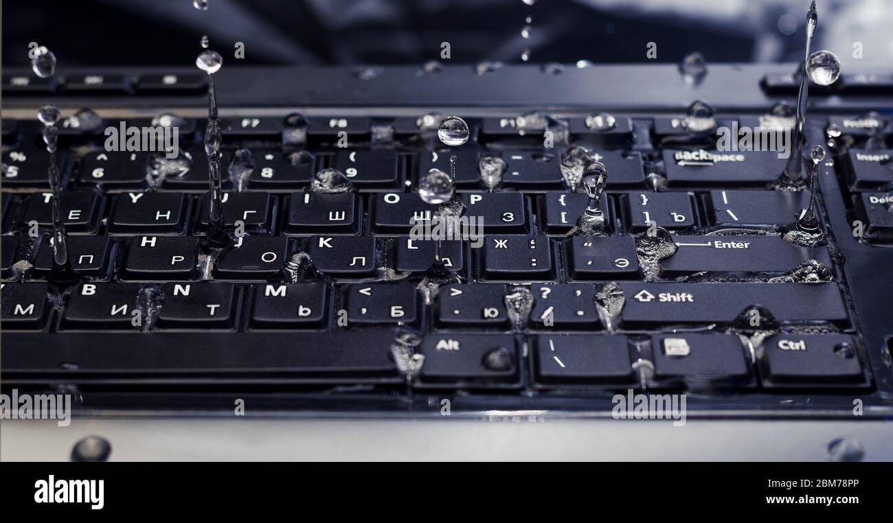 Water spill keyboard hi-res stock photography and images - Alamy