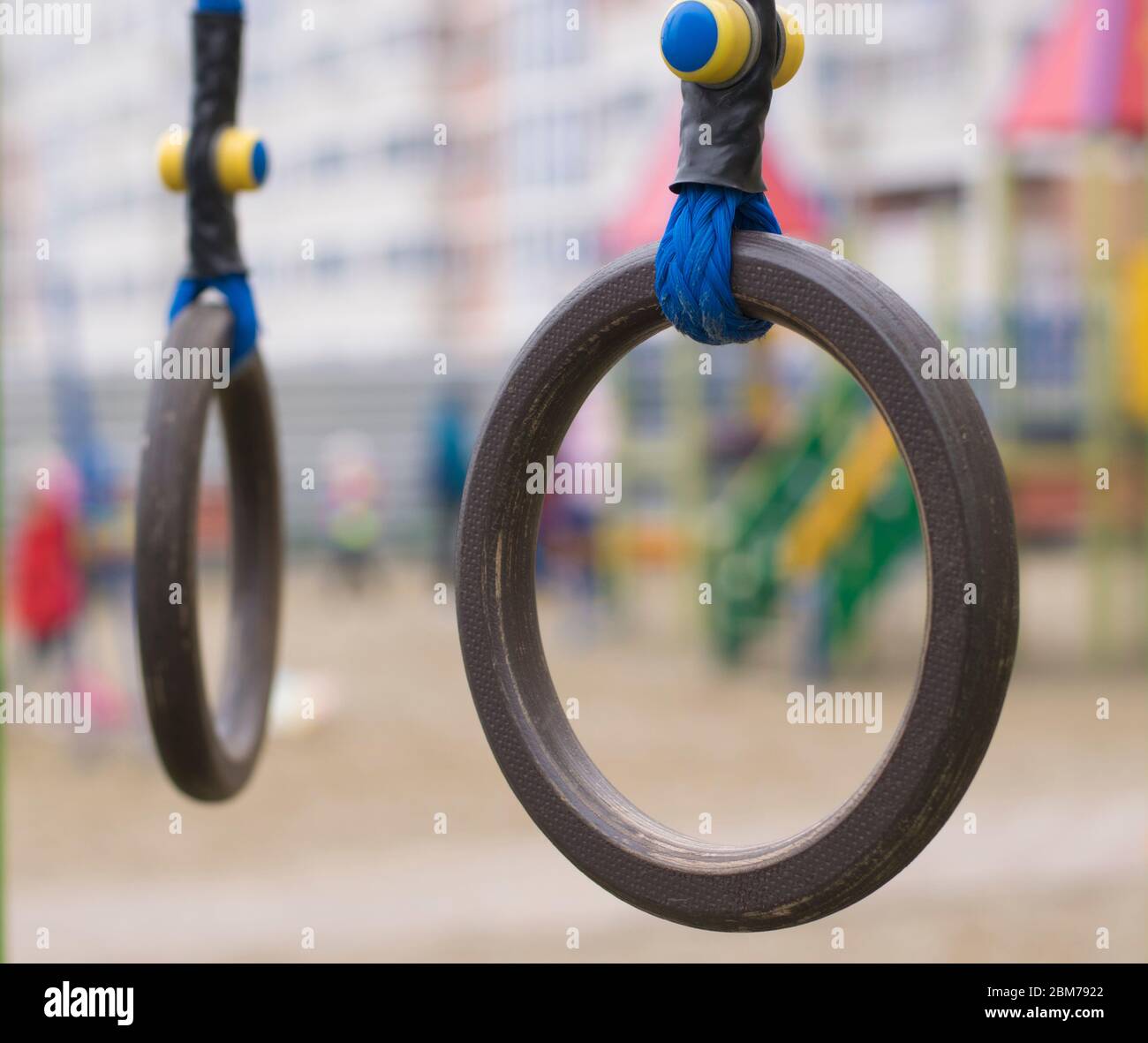 Sports projectile rings on a street playground Stock Photo - Alamy