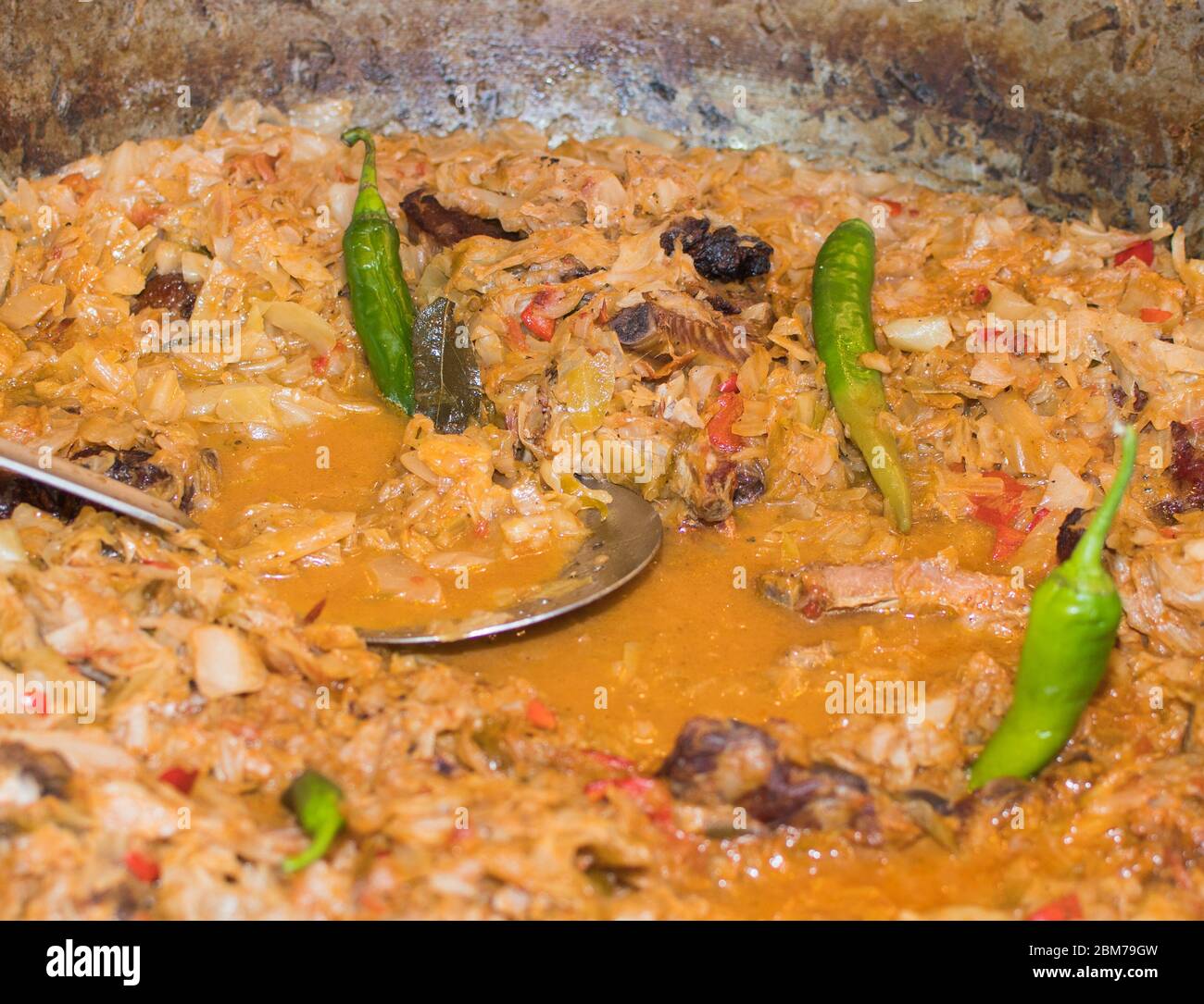 Traditional romanian dish named "sarmale", prepared in traditional oven ...