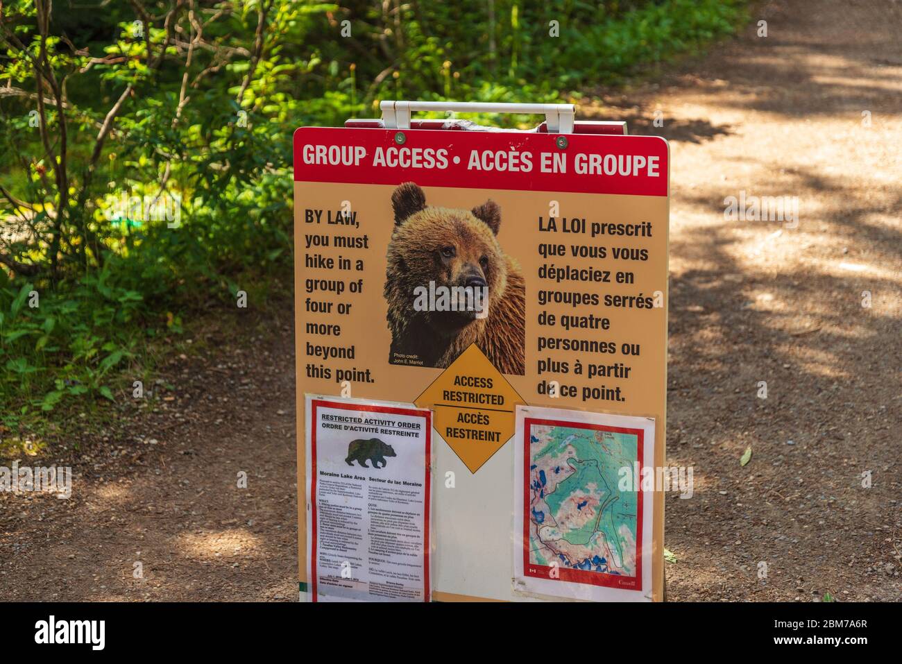 signs about the presence of bears around Lake Morraine, Banff National ...