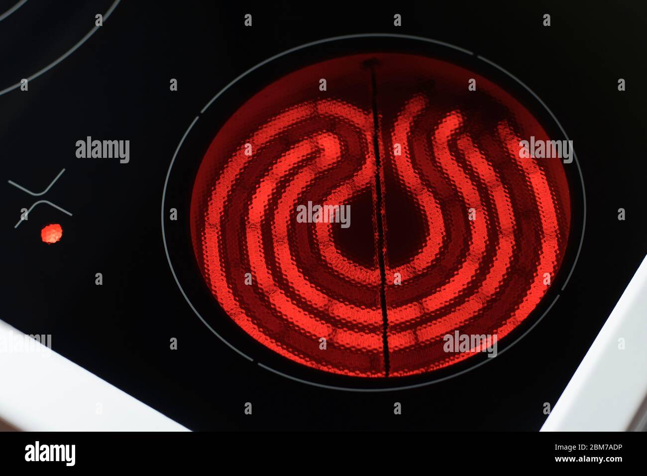 Spiral electric hob, heated to a high temperature Stock Photo - Alamy