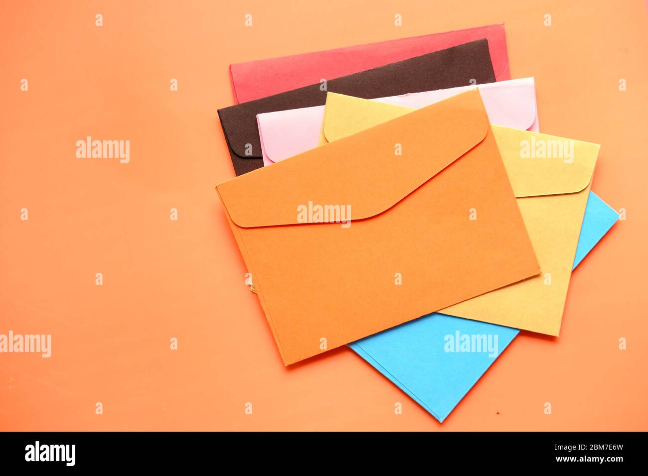 Colorful envelopes on white hi-res stock photography and images - Alamy
