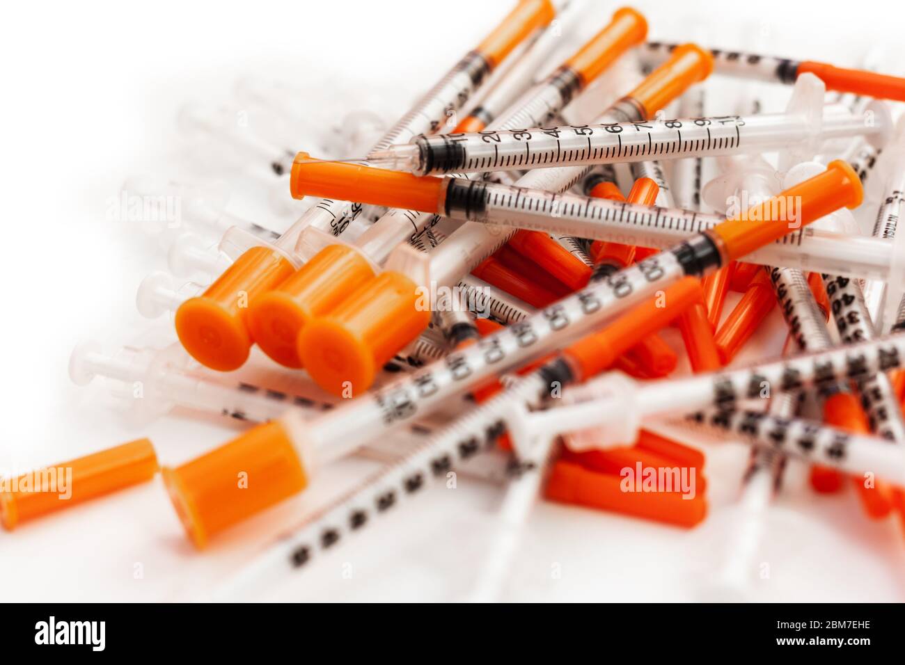 pile of syringes for diabetes on white background, healthcare concept ...