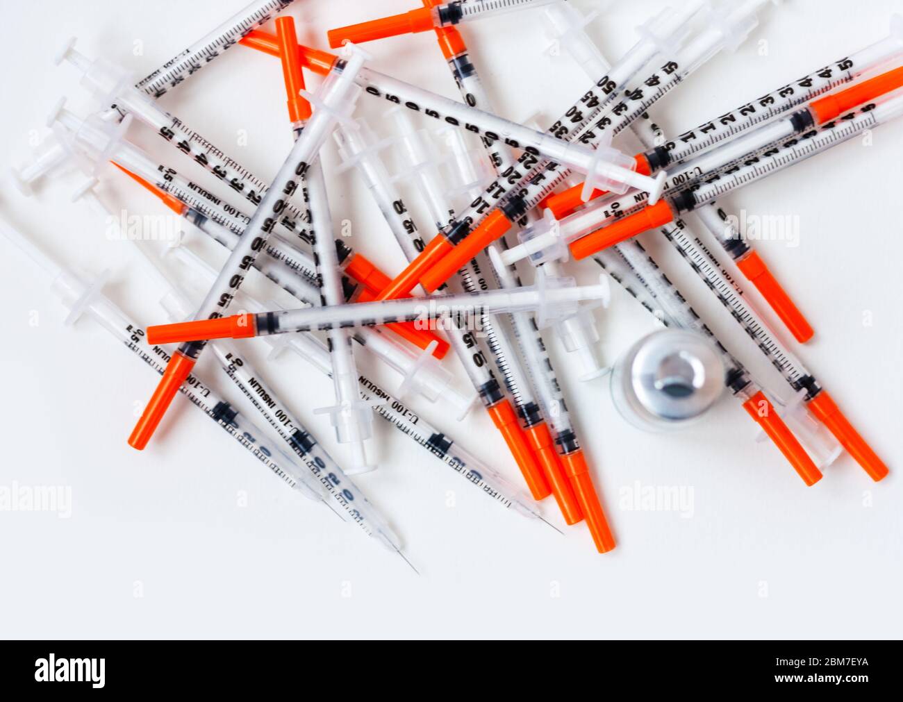 pile of syringes for diabetes on white background, healthcare concept ...