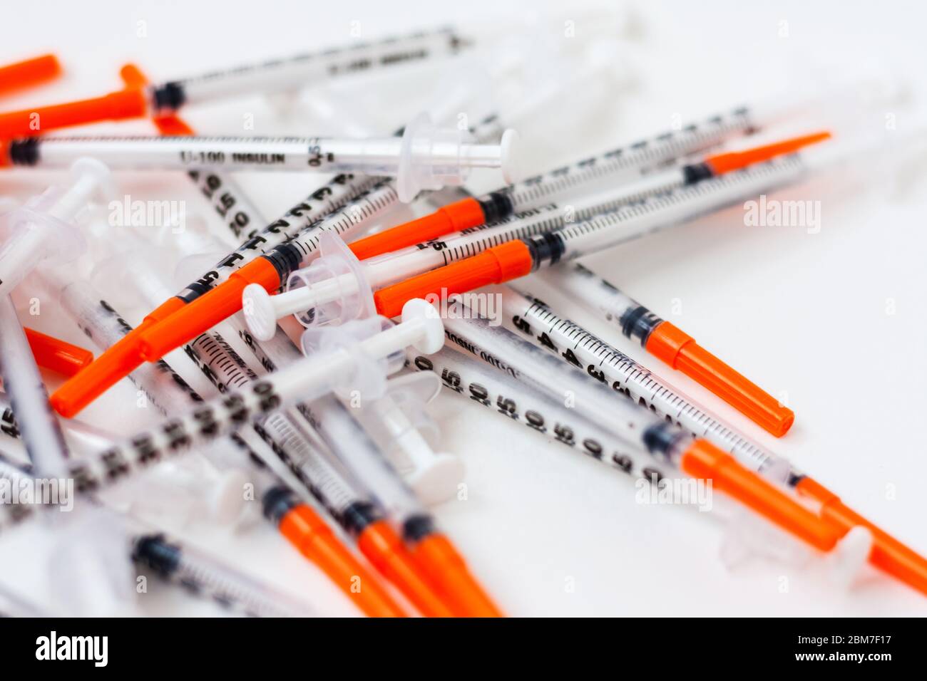 pile of syringes for diabetes on white background, healthcare concept ...