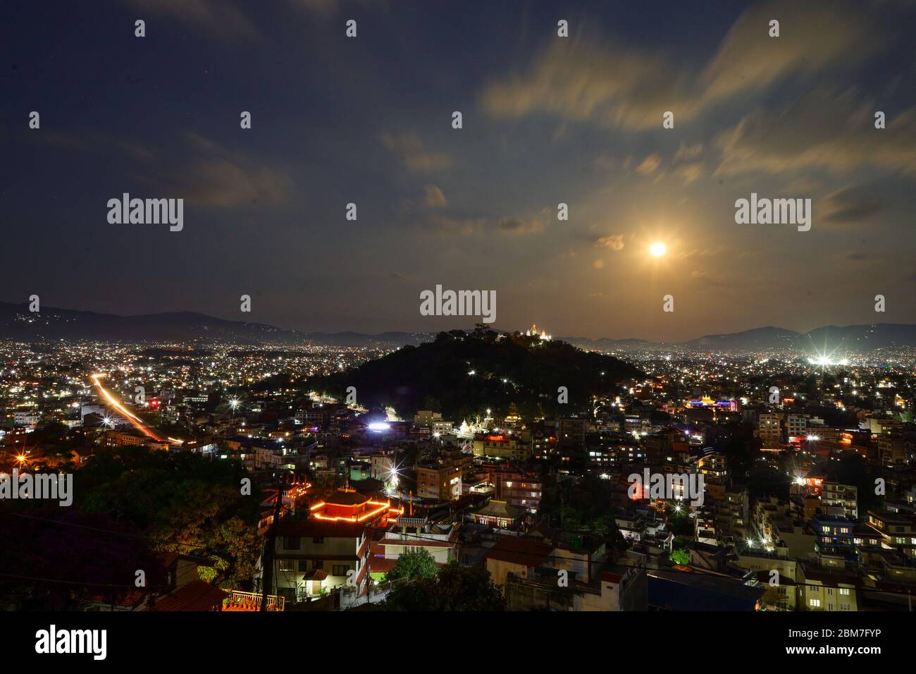 Kathmandu, Nepal. 07th May, 2020. Full moon rises over Swayambhunath ...