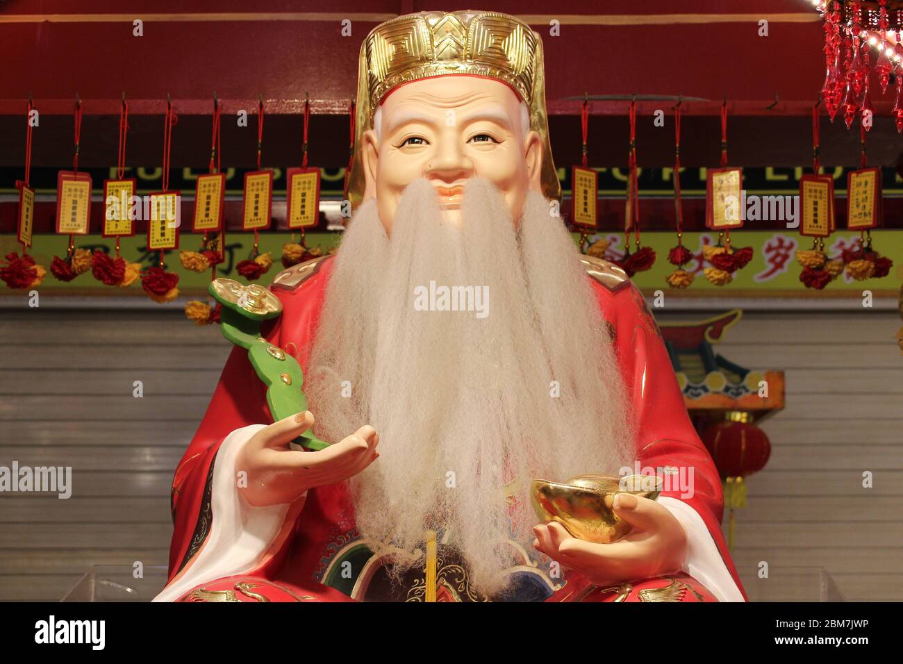 statue of a chinese divinity in the street in singapore Stock Photo - Alamy