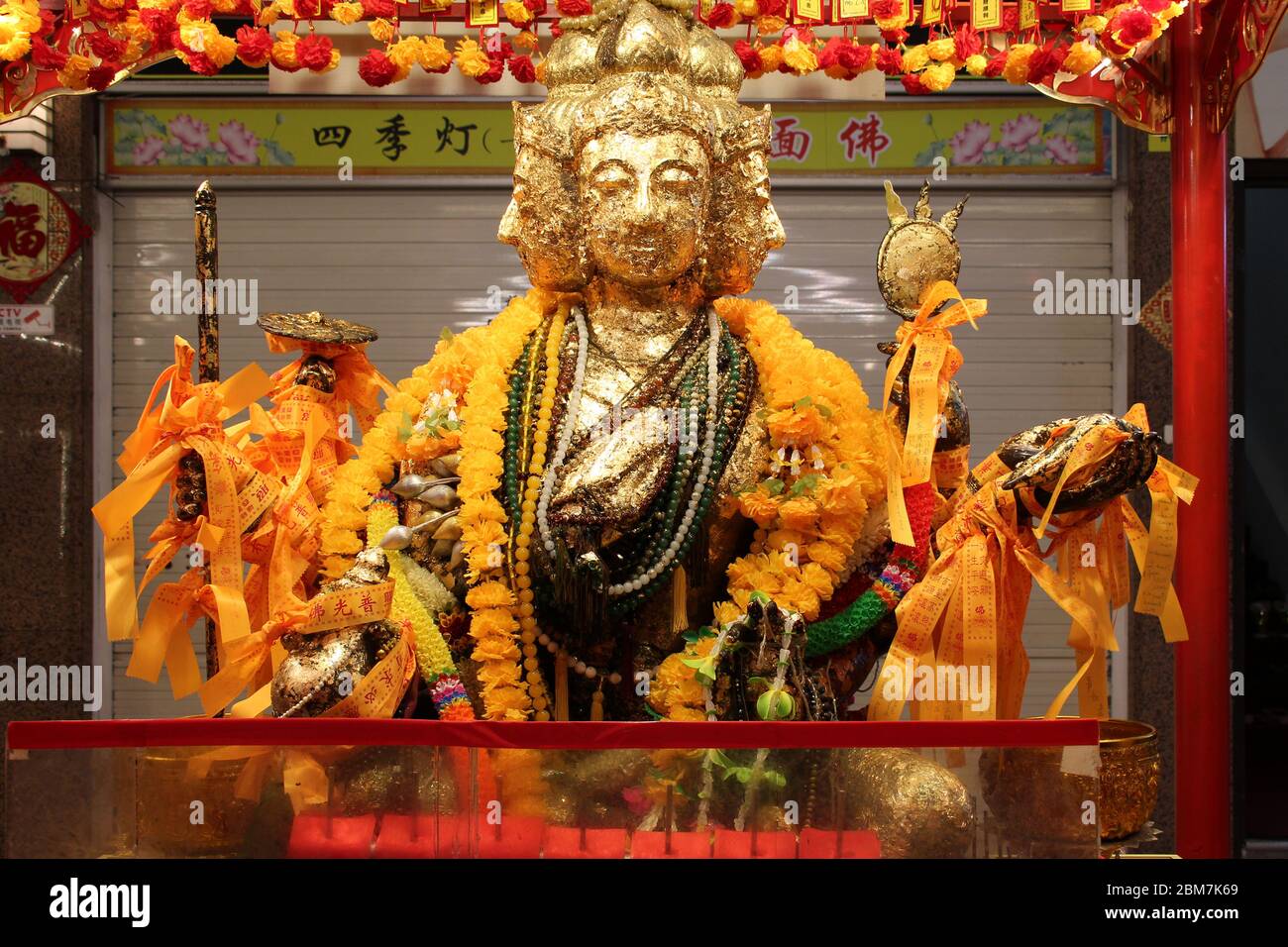 statue of a hindu divinity in the street in singapore Stock Photo - Alamy