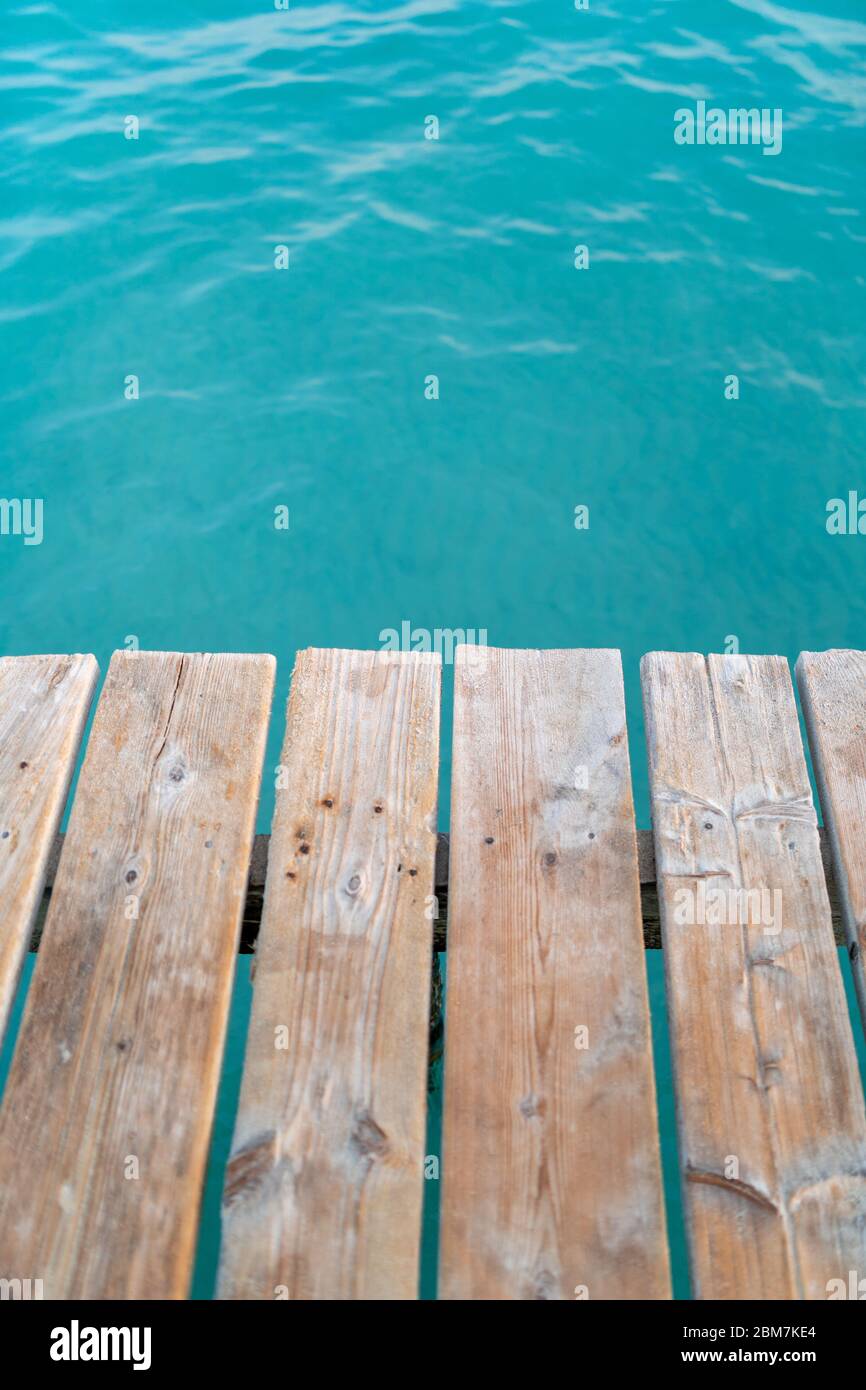 Wooden dock texture with blue turquoise water in tropical island Stock ...