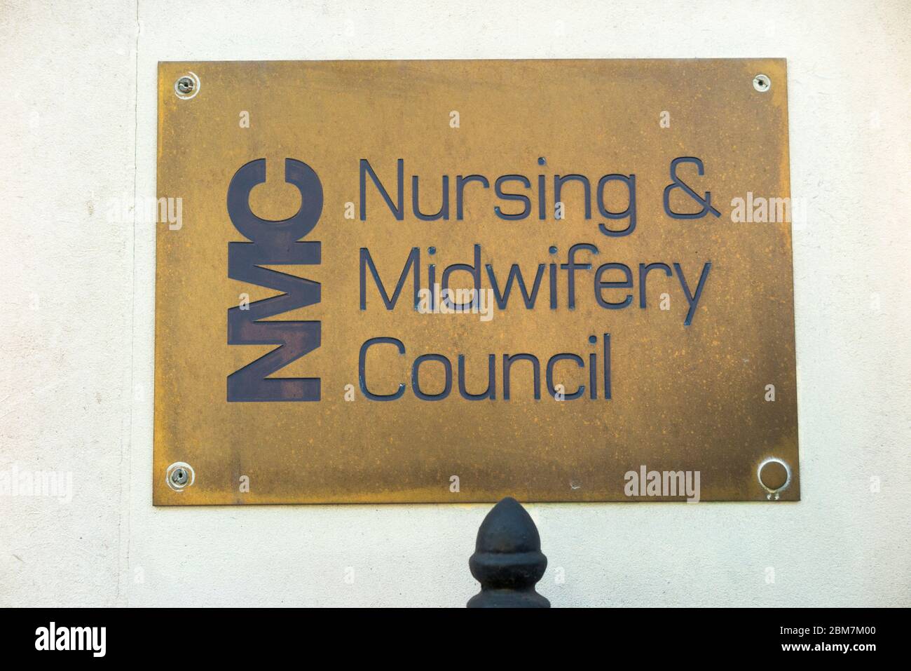 Brass name plate / plaque outside the offices of The Nursing and ...