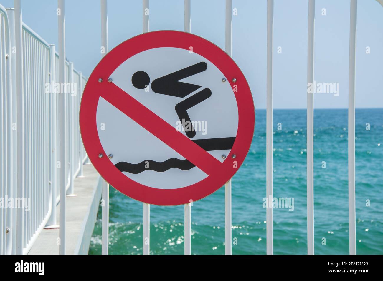 No diving into the water sign, prohibition, warning symbol, forbidding ...