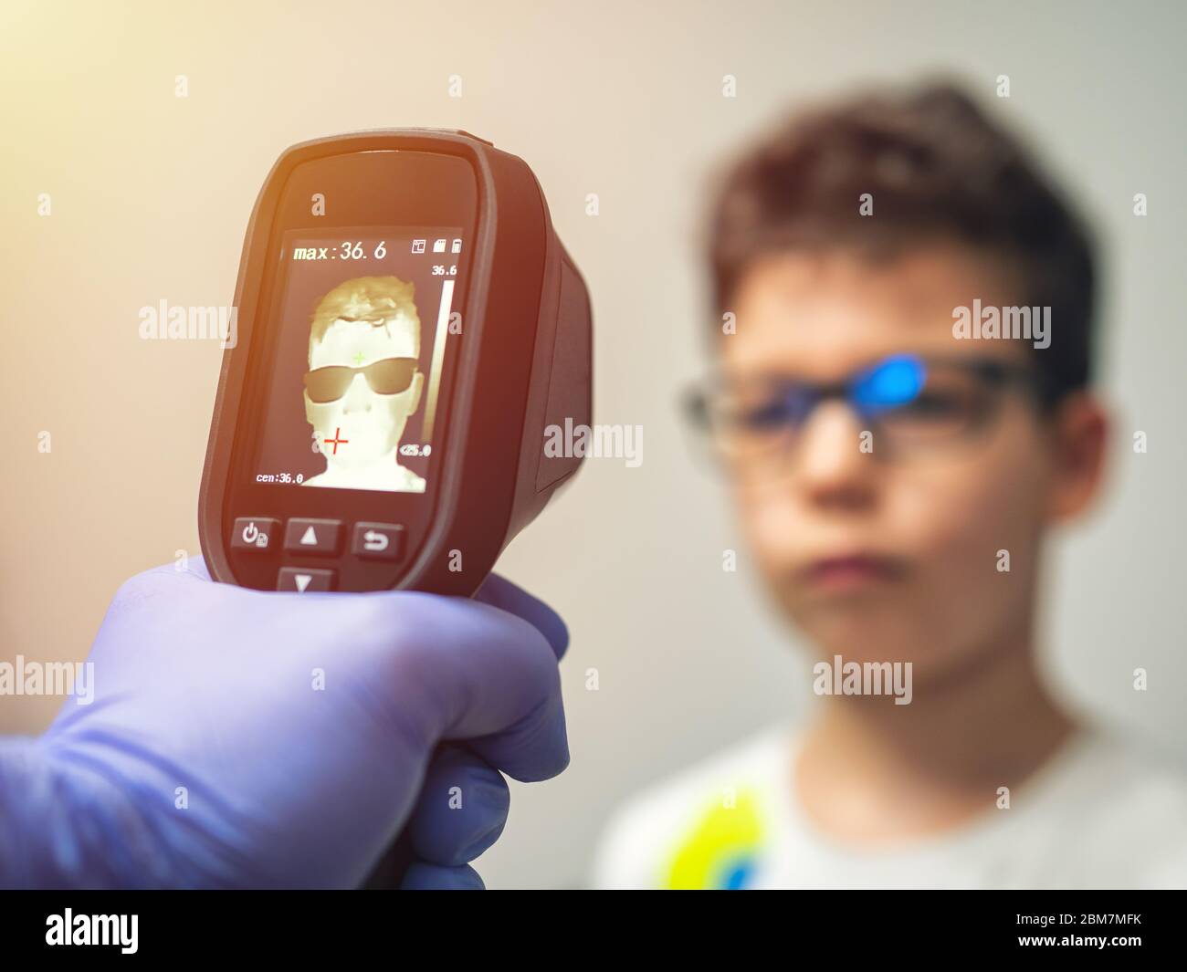 A thermal scanner for Fever And Symptoms of Coronavirus at College ...