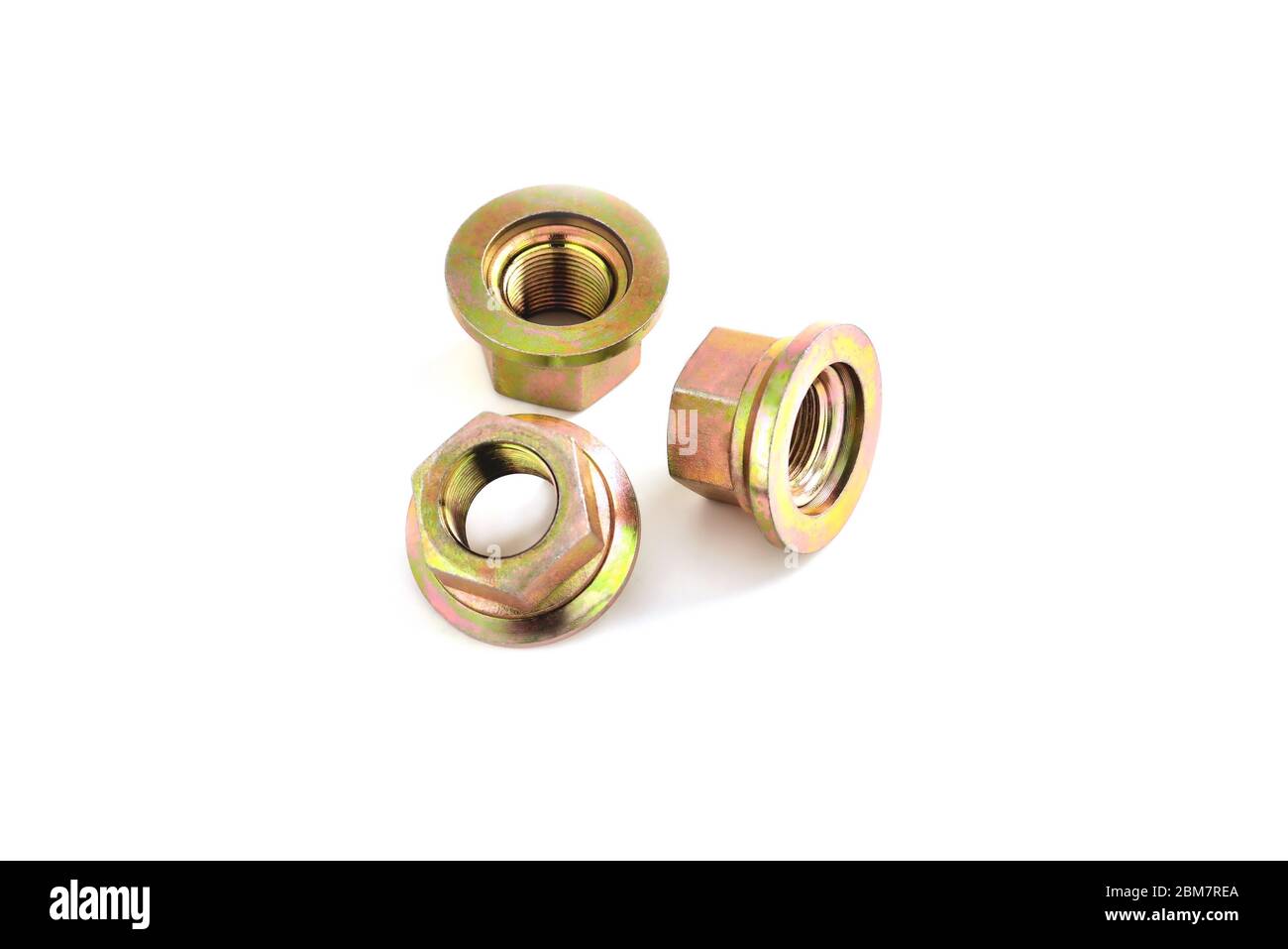 galvanized fixing nuts several pieces on a white background close-up ...