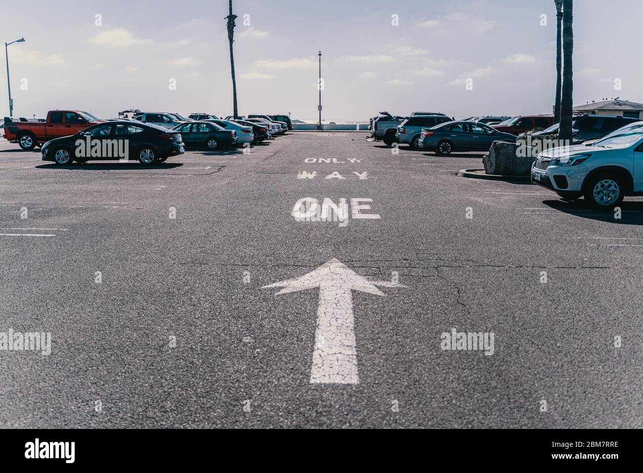 One Way Track on parking spot Stock Photo - Alamy