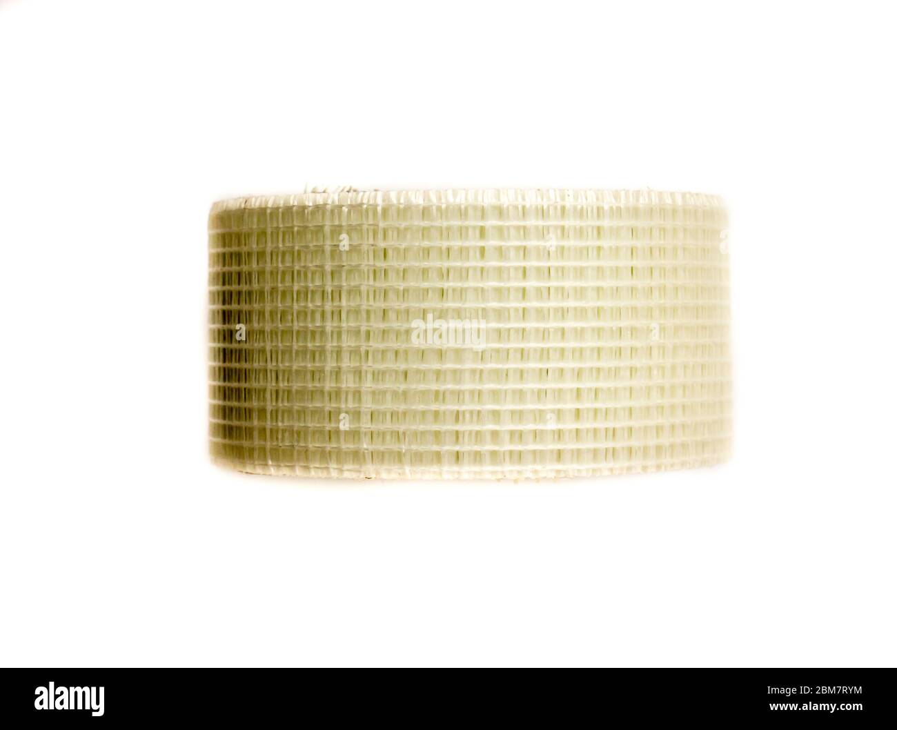 The Sticky yellow mesh tape Stock Photo - Alamy