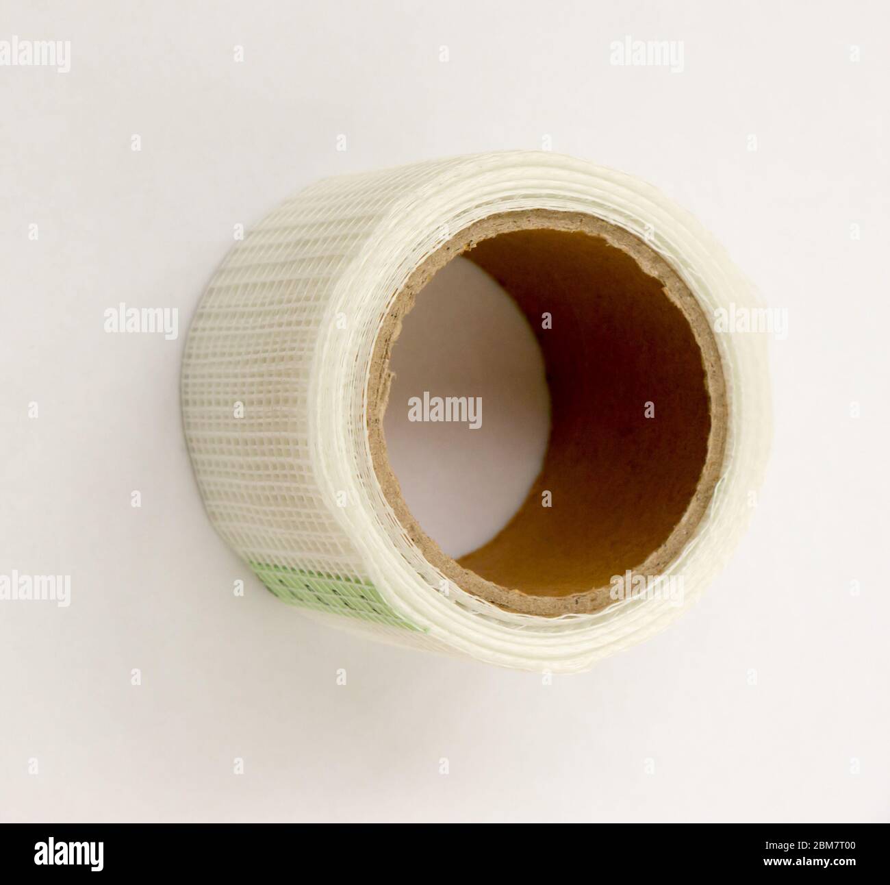 The Sticky yellow mesh tape Stock Photo - Alamy