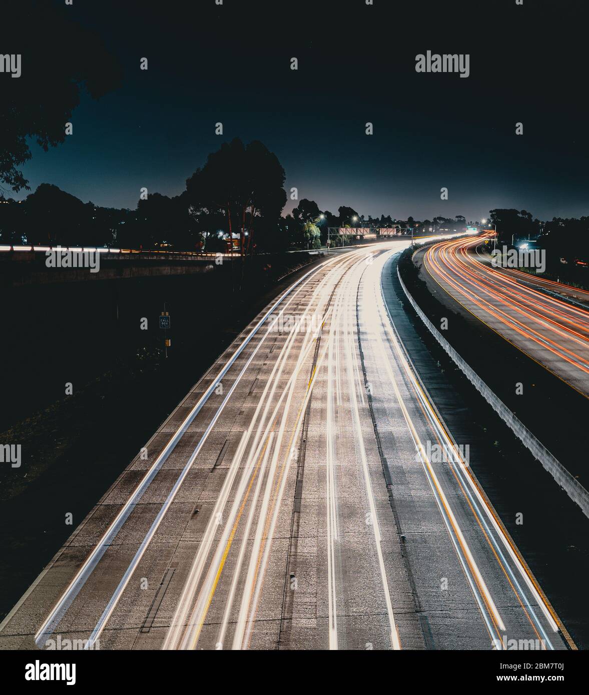 US highway at night Stock Photo - Alamy