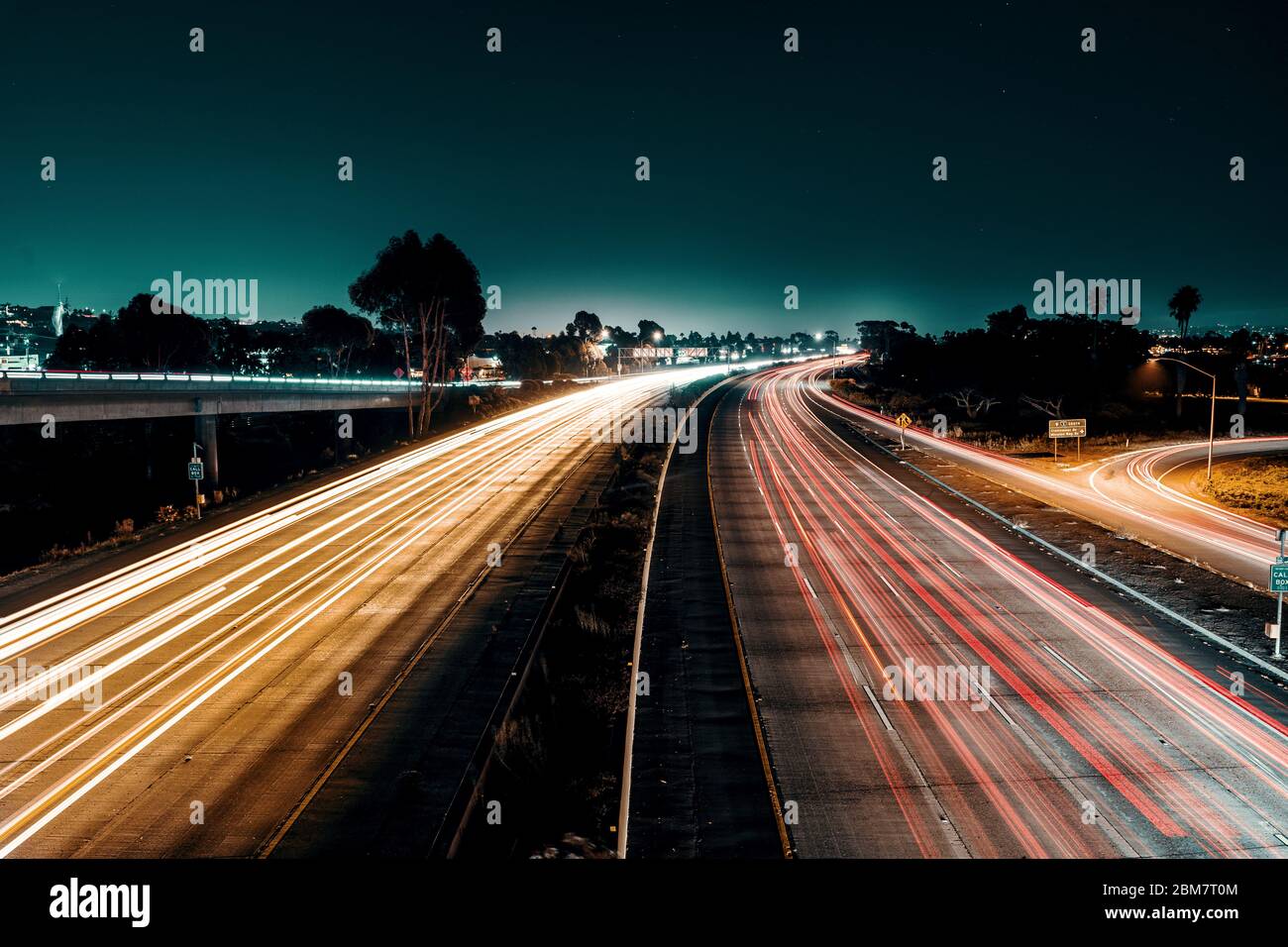 US highway at night Stock Photo - Alamy