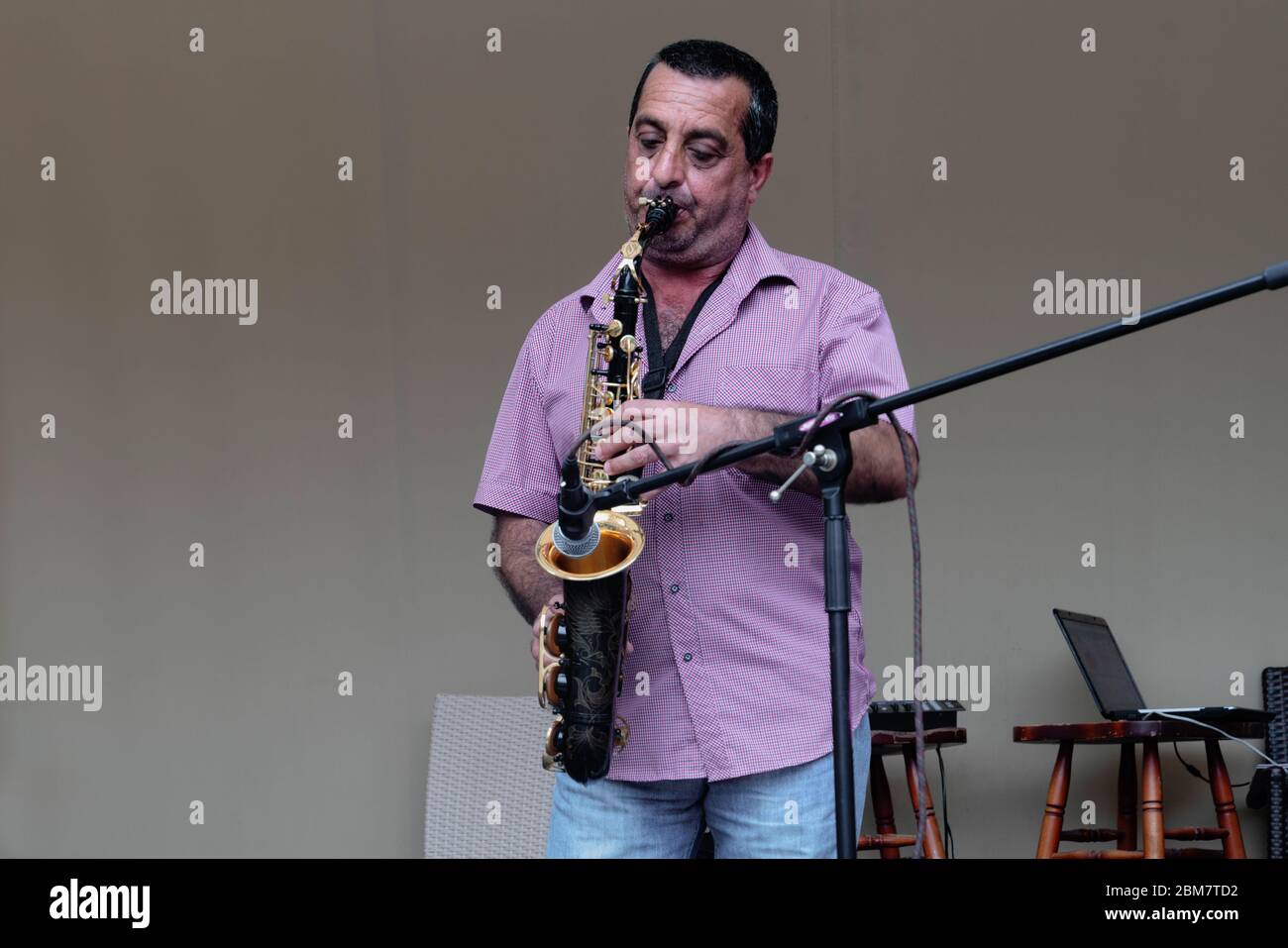 Man playing sax hi-res stock photography and images - Alamy