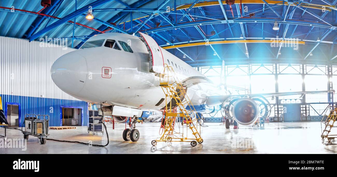 Panoramic view of aerospace hangar, civil aviation aircraft, repair and ...