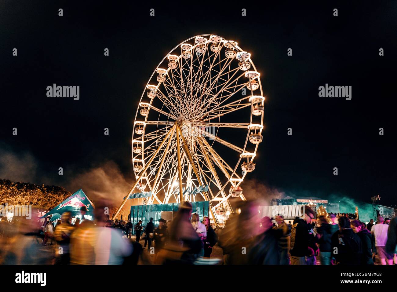 ferris wheel at night a festival Stock Photo - Alamy
