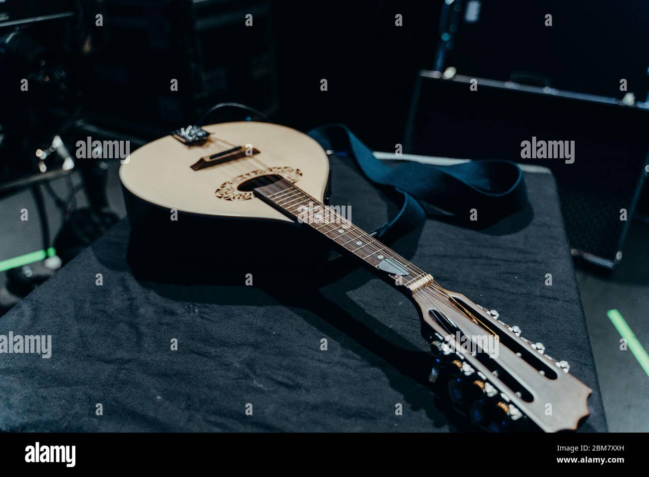 Mandolin on a concert stage, ready to be played with skill and passion ...