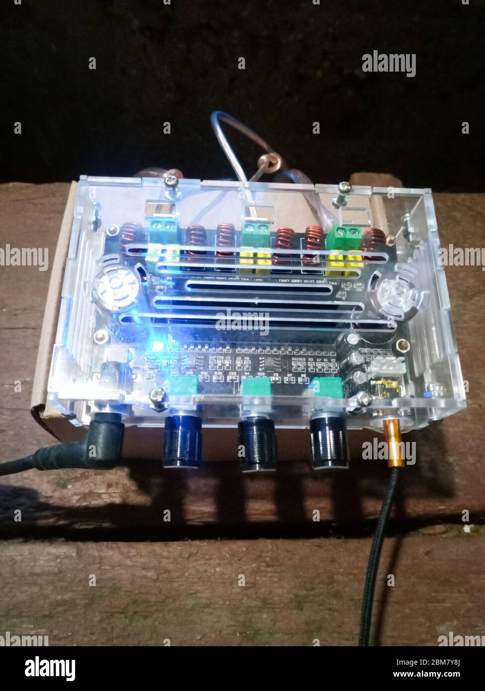 A small musical power amplifier in a plastic case Stock Photo - Alamy