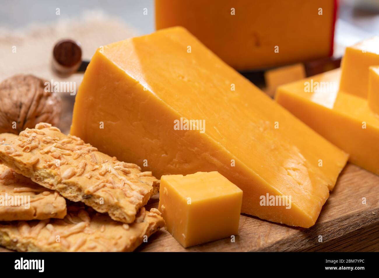 British red waxed yellow cheddar cheese and crackers with grated cheese ...