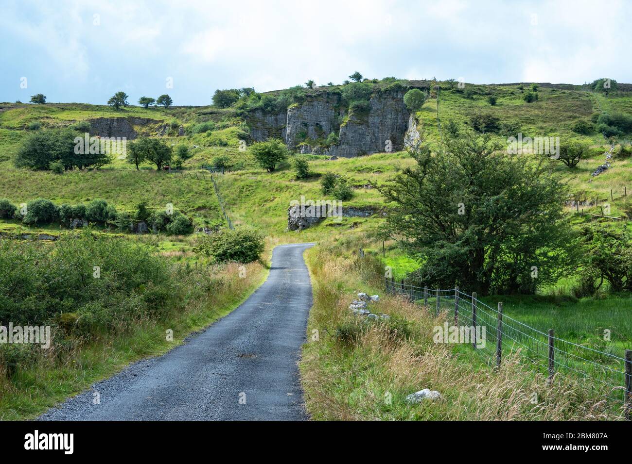 Small road to the old stones quarry in the country side, Co. Fermanagh ...