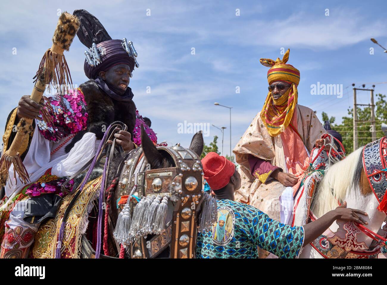 Nobleman rider dressed in a colourful outfit mounting an embellished ...