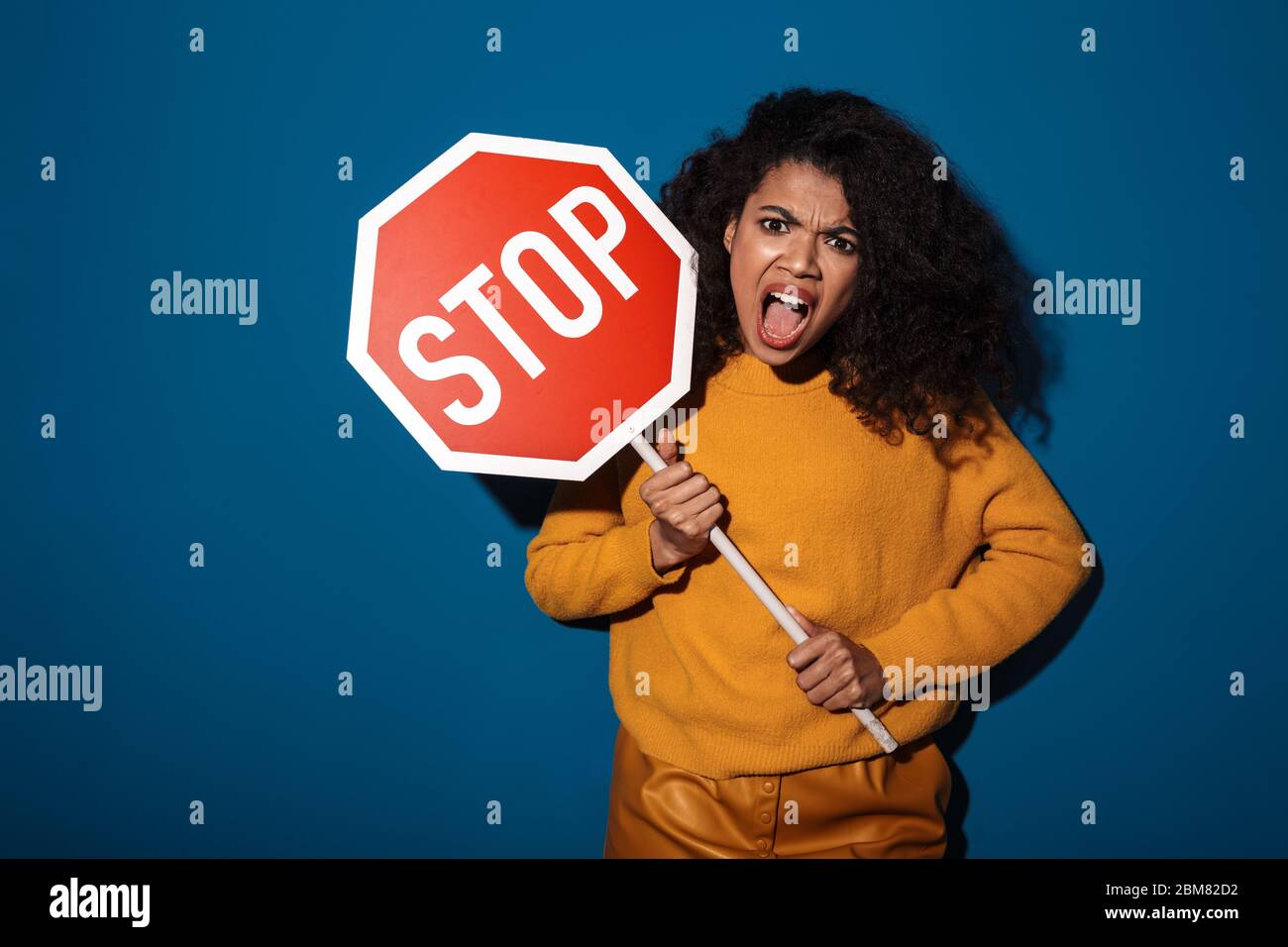 Image of displeased screaming young african woman posing isolated over ...