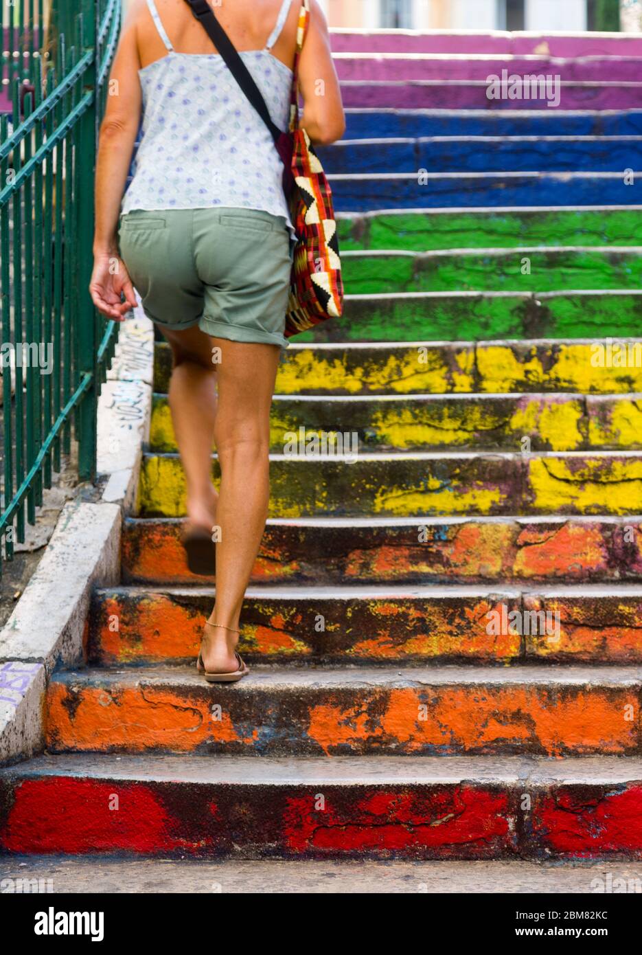 Women climbing stairs hi-res stock photography and images - Alamy