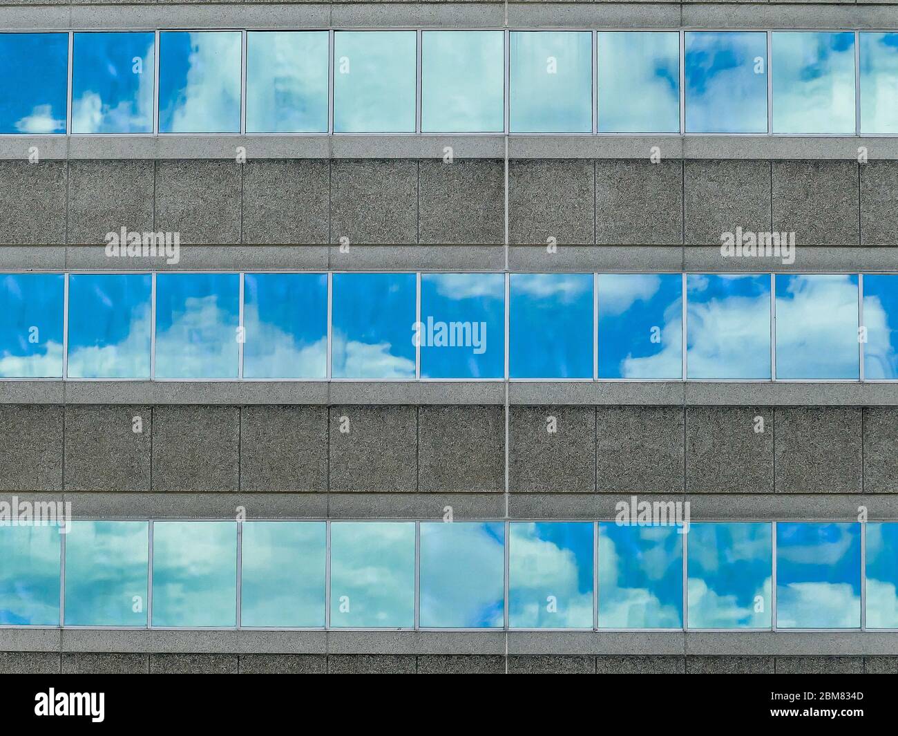 Architecture background with windows and clouds reflection Stock Photo ...