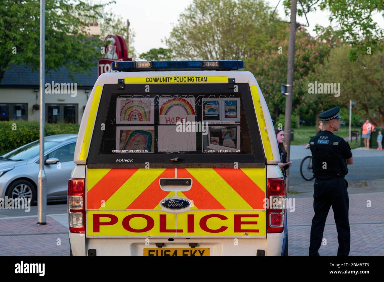 Police vehicle with nhs posters hi-res stock photography and images - Alamy